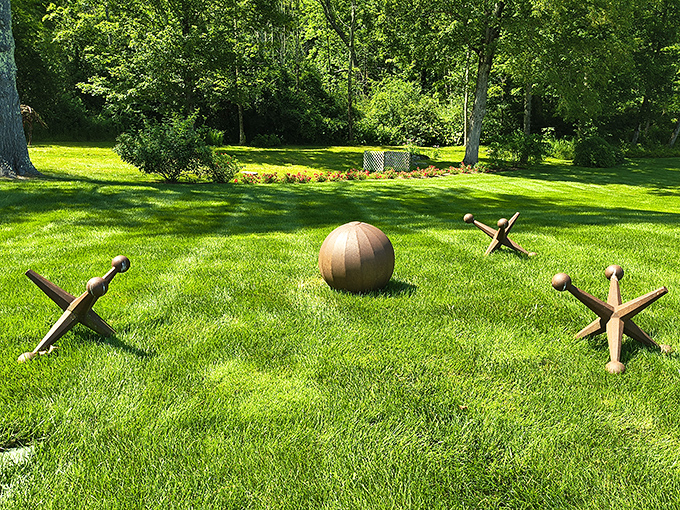 That metallic sphere looks like it fell from space and decided Vermont was nice enough to stay permanently.