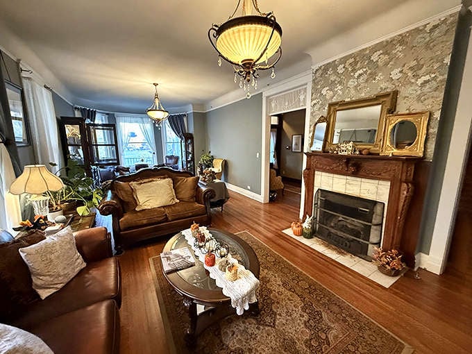 This isn't your grandmother's stuffy parlor, it's a living room that actually invites you to live in it, with comfortable seating and warm touches that make you want to settle in.