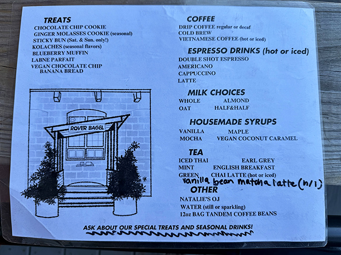 The menu board reveals a thoughtful selection of treats and beverages, including housemade syrups that elevate your morning coffee ritual.