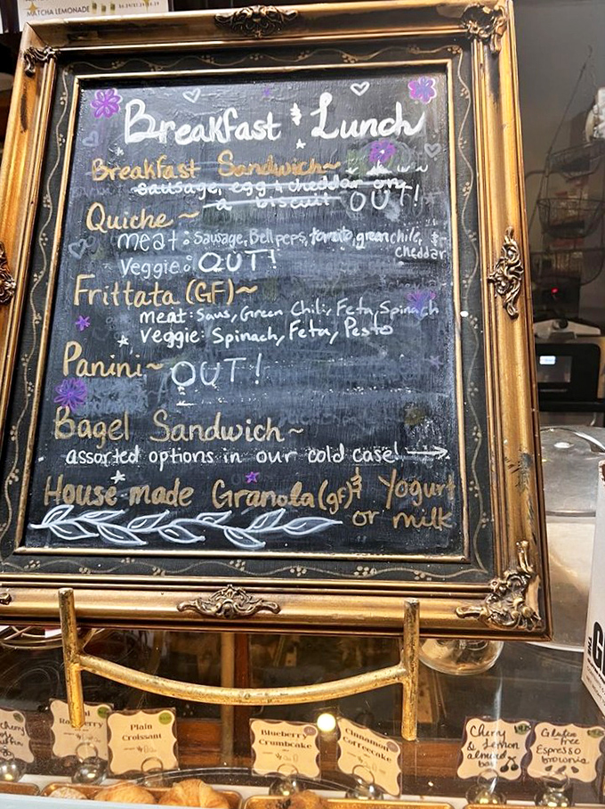 The elegantly framed menu board showcases breakfast treasures &ndash; each item crossed out as it sells out, creating a delicious daily countdown.