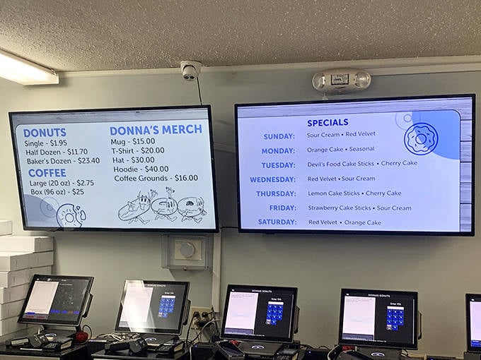 The digital menu board showcases daily specials that regulars have memorized like sacred text, with different delights for each day.