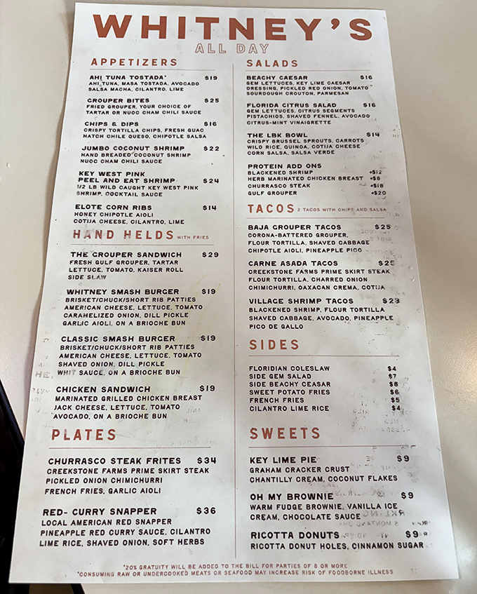 Whitney's menu reads like a love letter to Florida's bounty – from Gulf grouper to Key lime pie, each dish celebrates coastal cuisine with modern flair.