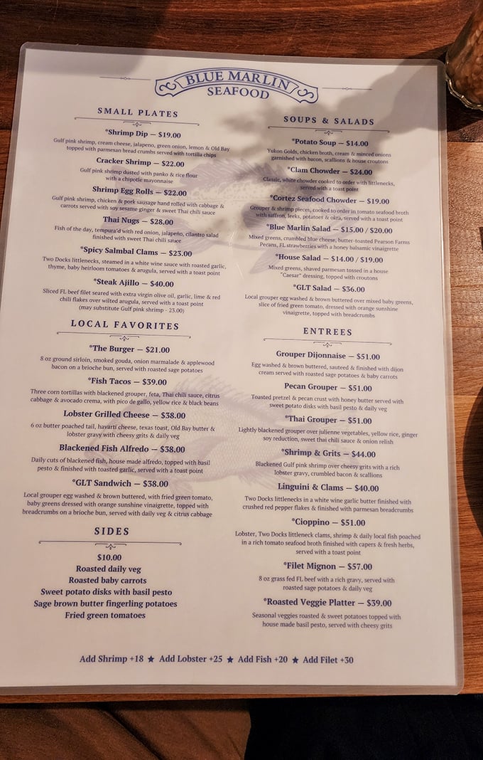 The menu reads like a love letter to Gulf seafood, with everything from Thai Nogs to that legendary Guava Lime Pie tempting hungry visitors.