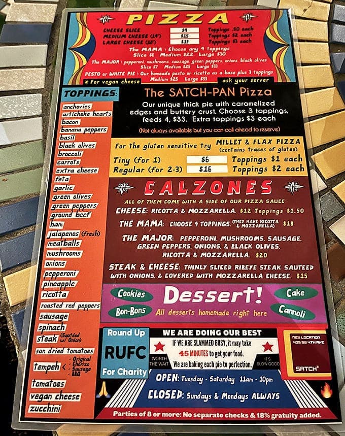 The menu board is a work of art itself&mdash;a colorful testament to pizza possibilities that makes ordering feel like a joyful adventure.