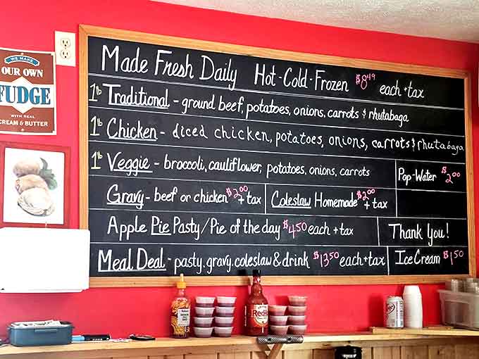 The handwritten menu board keeps things simple: traditional, chicken, veggie, and the star attraction that brings people back again and again.