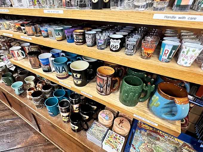 Coffee mugs in every color and design imaginable line the shelves, from Route 66 classics to Arizona pride pieces that'll make your morning brew taste like adventure.