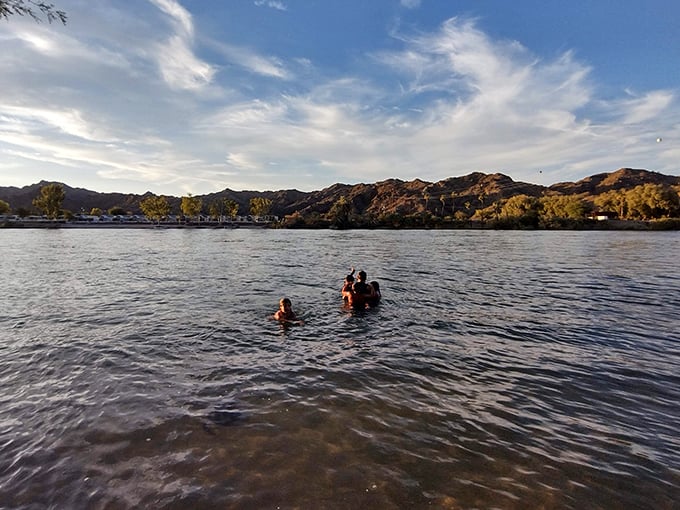 Family memories in the making as cool river waters offer sweet relief from the desert heat.