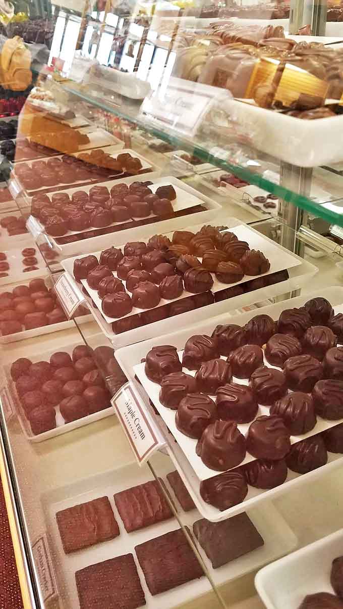 A chocolate lover's dream lineup &ndash; each tray showcases handcrafted confections arranged with precision that would make a jeweler jealous.