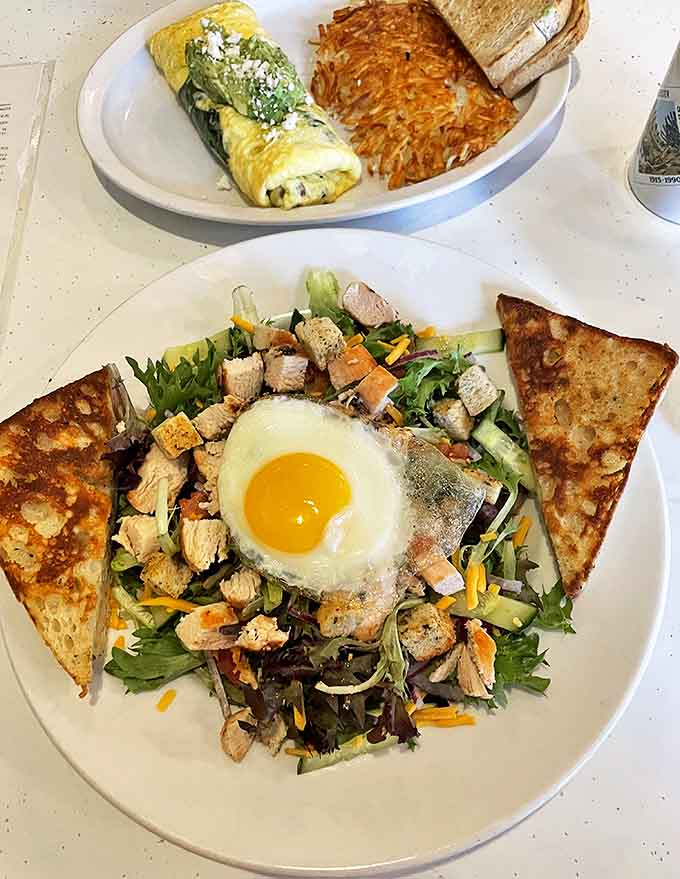 Garden salad gets the royal treatment with perfectly grilled chicken, a sunny-side-up egg crown, and toast soldiers standing guard. Healthy never looked so tempting.