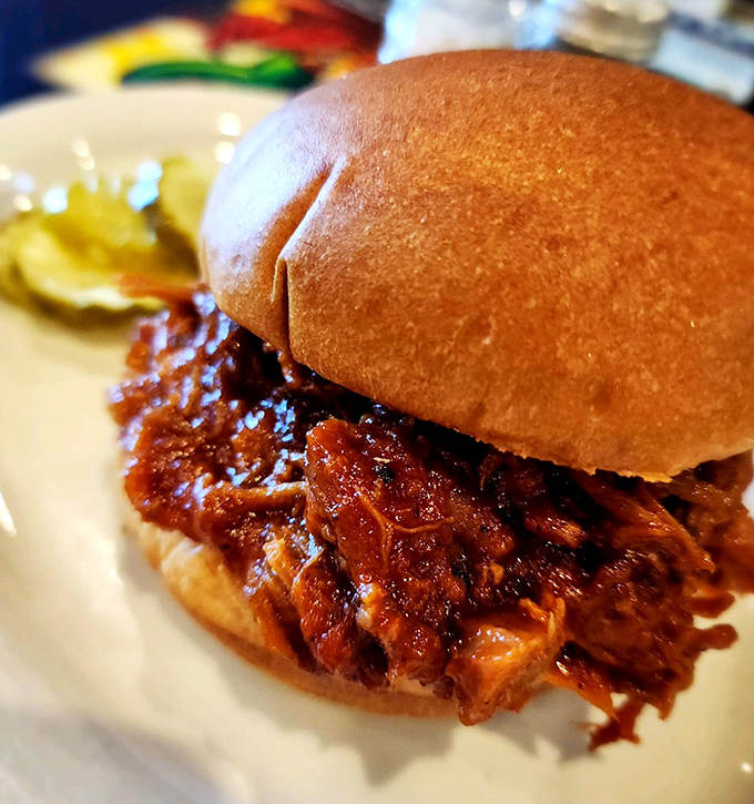 BBQ Pulled Pork Sandwich The crown jewel of Oler's&mdash;tender, smoky pork glistening with that perfect sauce on a pillowy bun.