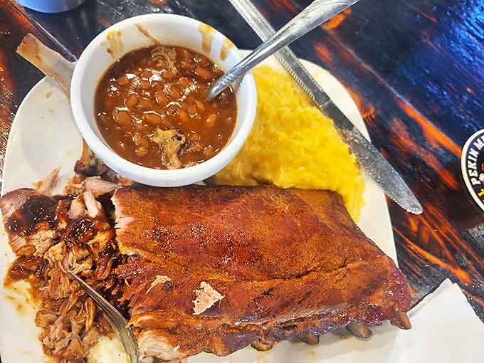 These ribs have achieved that perfect tenderness that makes barbecue lovers weep with joy, smoke ring visible and bark beautifully caramelized.