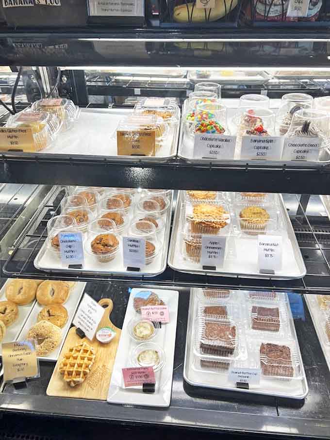 The display case at Sweet Aromas isn't just a bakery showcase &ndash; it's a museum of edible art where decision-making becomes deliciously difficult.