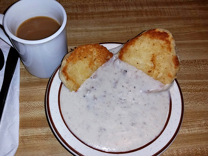Cloud-like perfection: The legendary biscuits and gravy feature creamy, peppery sauce blanketing homemade biscuits that would make any Southern grandmother proud.