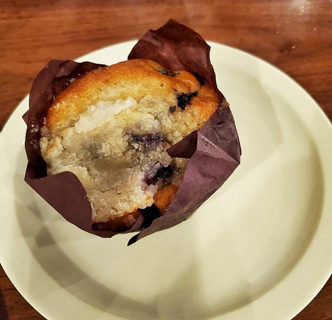 This blueberry muffin isn't just breakfast &ndash; it's an edible masterpiece with a golden crown and berry-studded interior.