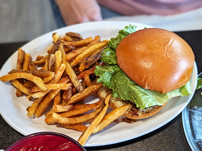 This isn't just a burger &ndash; it's a revelation on a plate. Golden fries, perfectly toasted bun, and a patty so juicy you'll need extra napkins.
