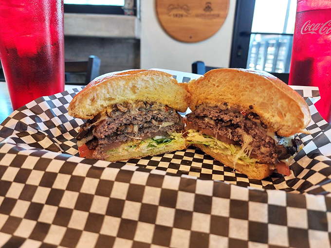 Burger perfection, sliced in half for your viewing pleasure &ndash; the cross-section reveals juicy secrets within.