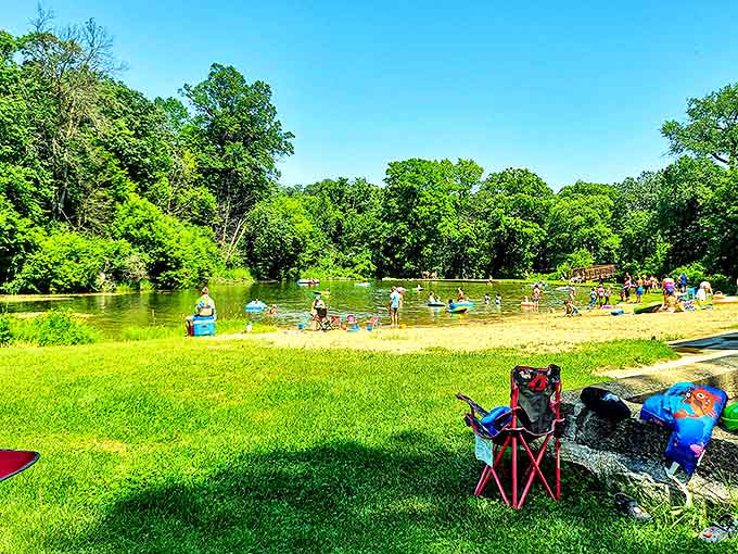 Families create summer memories at the swimming beach, where laughter echoes across water that sparkles like liquid diamonds.