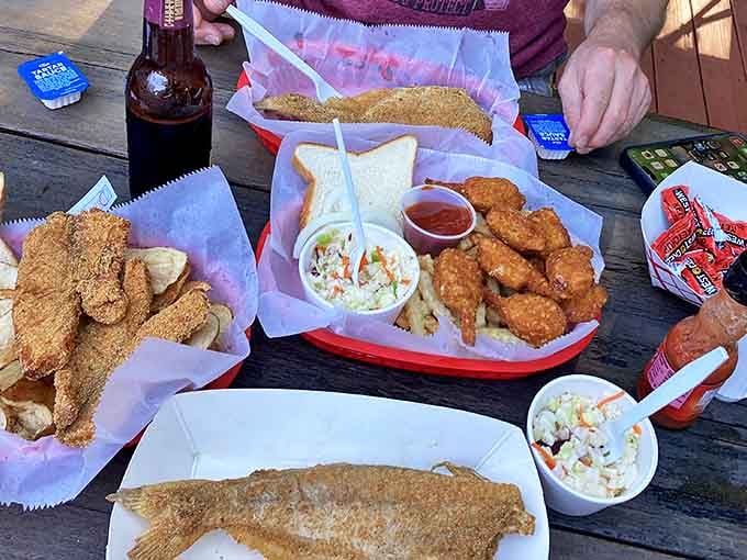 These catfish dinners arrive like edible sunshine, golden and glorious, ready to make all your fried fish dreams come true.