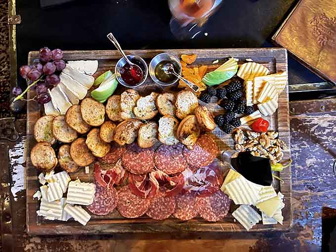 A wooden plank transforms into an edible masterpiece &ndash; cured meats, artisanal cheeses, and seasonal accompaniments that make every bite a discovery.