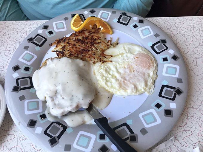 This isn't just food&mdash;it's edible therapy. Crispy breading, tender beef, and gravy that could make a grown man weep.