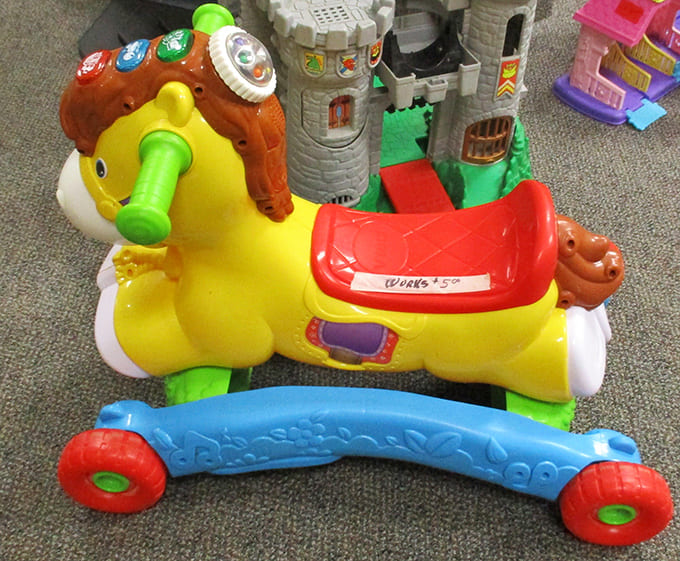 This cheerful yellow ride-on horse hasn't lost its charm, ready to carry a new generation of tiny adventurers.