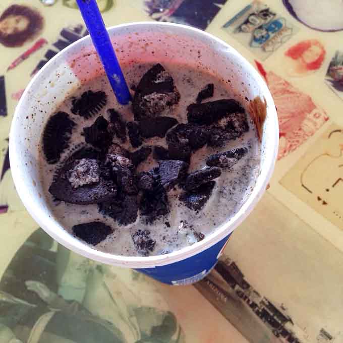 Oreo milkshake so thick and loaded, it's basically a drinkable cookie jar that'll make your inner child very, very happy.
