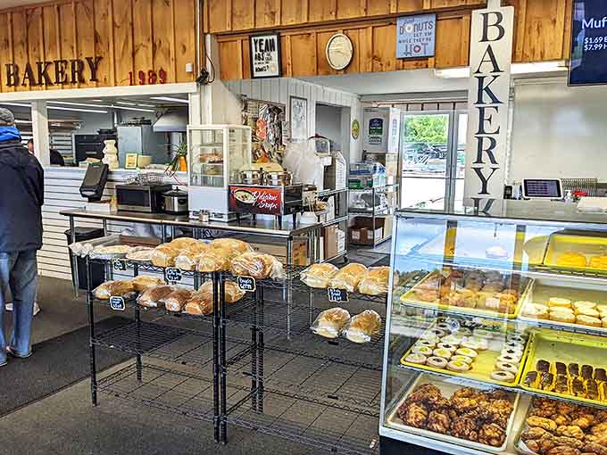 The bakery equivalent of a jewelry store display case, where every shelf holds something more tempting than the last.