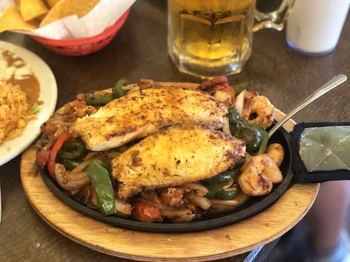 Sizzling fajitas arrive like rock stars making an entrance, and yes, everyone will turn to look at your table.