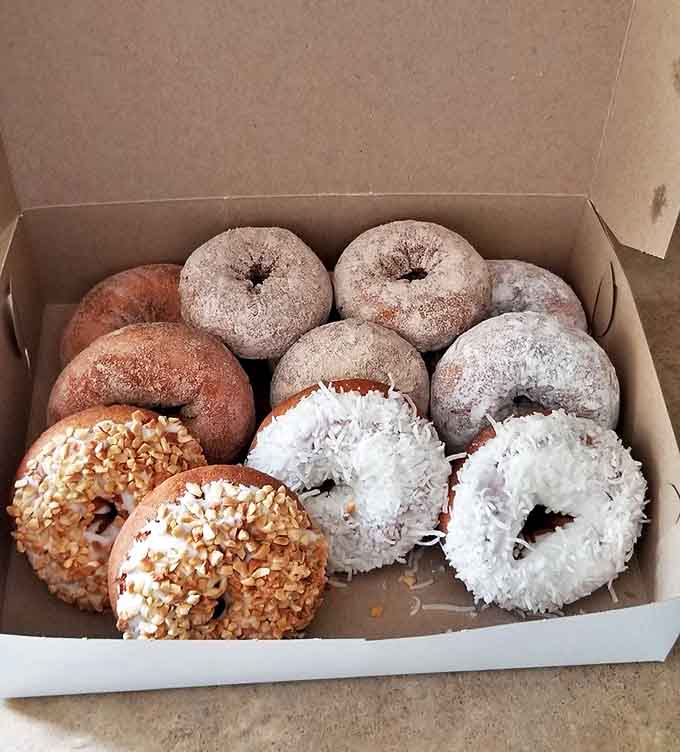 The breakfast equivalent of a treasure chest &ndash; golden-fried rings dusted with sugar and topped with nutty goodness.