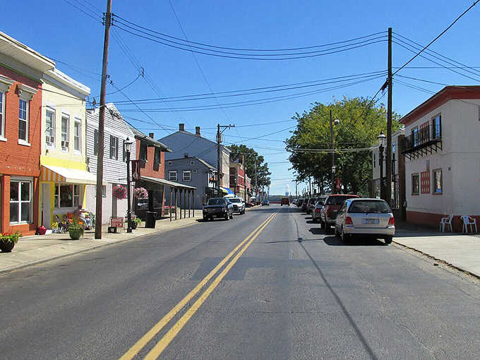 Downtown streets lined with colorful storefronts invite leisurely exploration, where the pace slows and conversations with strangers become the norm.