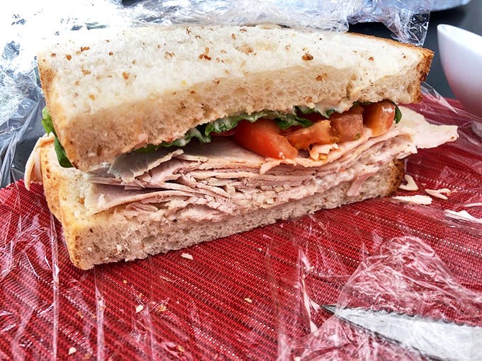 Not just any turkey sandwich &ndash; a masterpiece of perfectly roasted meat, garden-fresh veggies, and bread that deserves its own fan club.