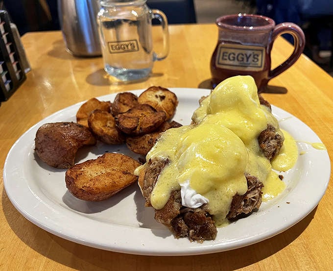 Behold the Benedict in all its glory: perfectly poached eggs, silky hollandaise, and those golden hash browns that complete the picture.