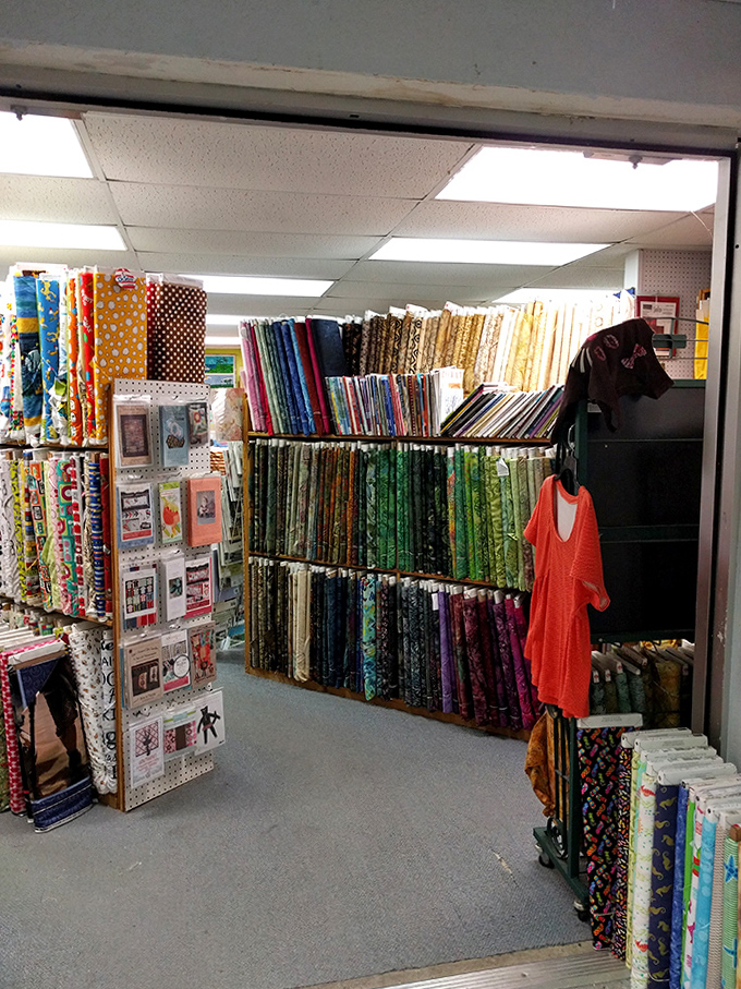 Walking through these aisles feels like stepping into a textile library where touching the books isn't just allowed&mdash;it's encouraged!