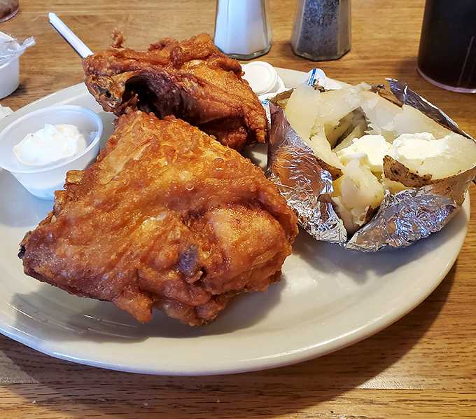 Golden-fried perfection meets fluffy potato – this chicken dinner might just ruin all other fried chicken for you forever.