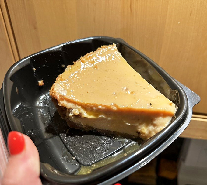 This slice of heaven isn't just dessert&mdash;it's a tropical vacation captured in creamy, sunset-hued perfection that makes conversation stop mid-sentence.