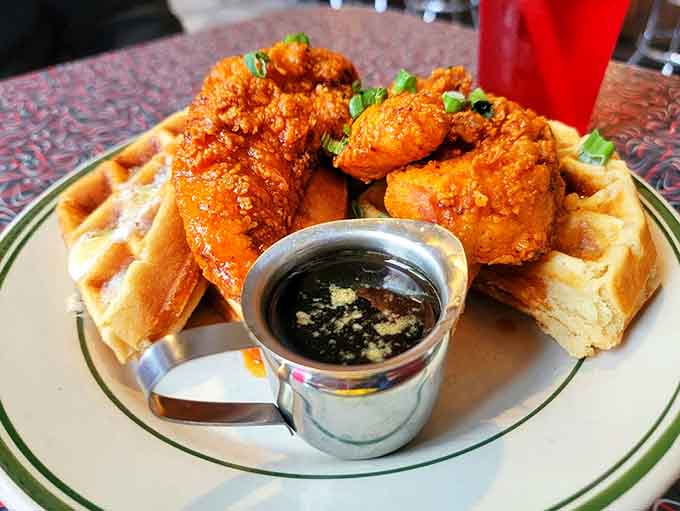 Golden fried chicken meets fluffy waffles in a marriage that would make any matchmaker proud.