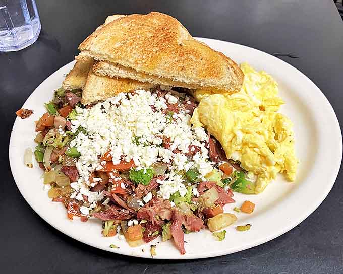 Behold the Hippie Hash in all its glory, a mountain of hash browns, vegetables, and feta that could fuel a small army.