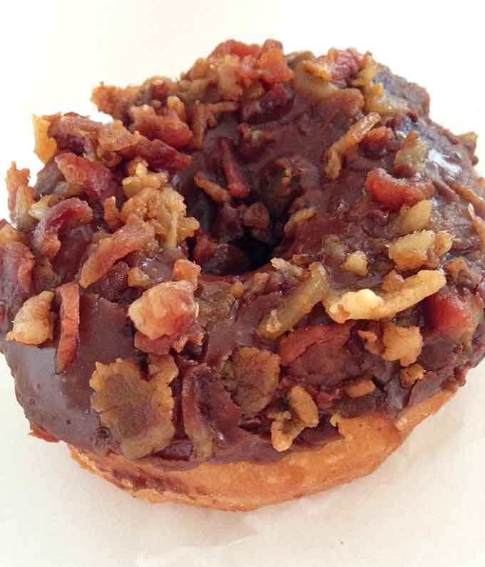 The maple bacon donut: proof that breakfast meats and desserts can live together in perfect, crispy, sweet harmony.
