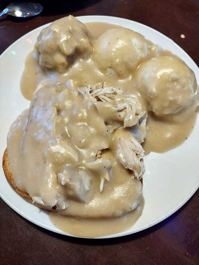 This isn't just turkey and gravy &ndash; it's a masterpiece of comfort where tender meat and velvety sauce transform bread into a canvas.