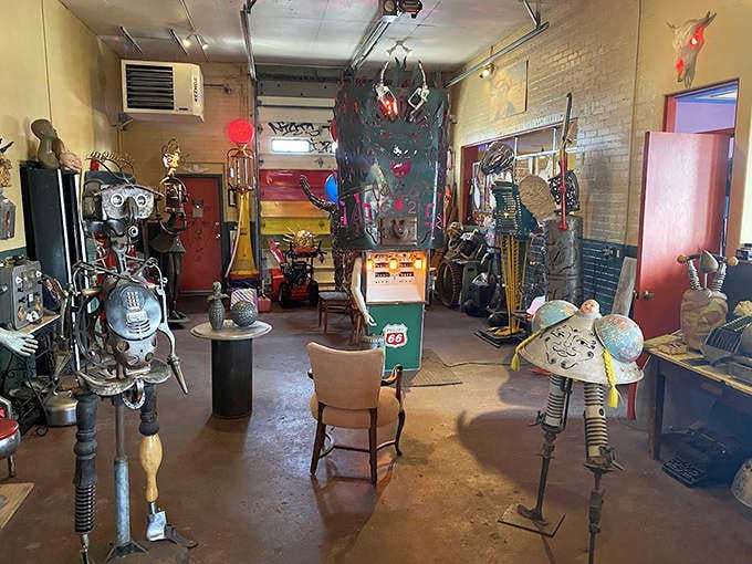 The interior reveals a wonderland of weird where every corner offers a new surprise, bathed in theatrical lighting.