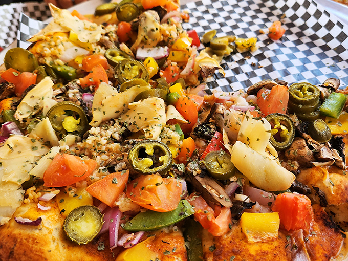 A masterpiece of fusion cuisine where tikka masala sauce meets jalape&ntilde;os and pineapple in a cross-cultural flavor explosion.