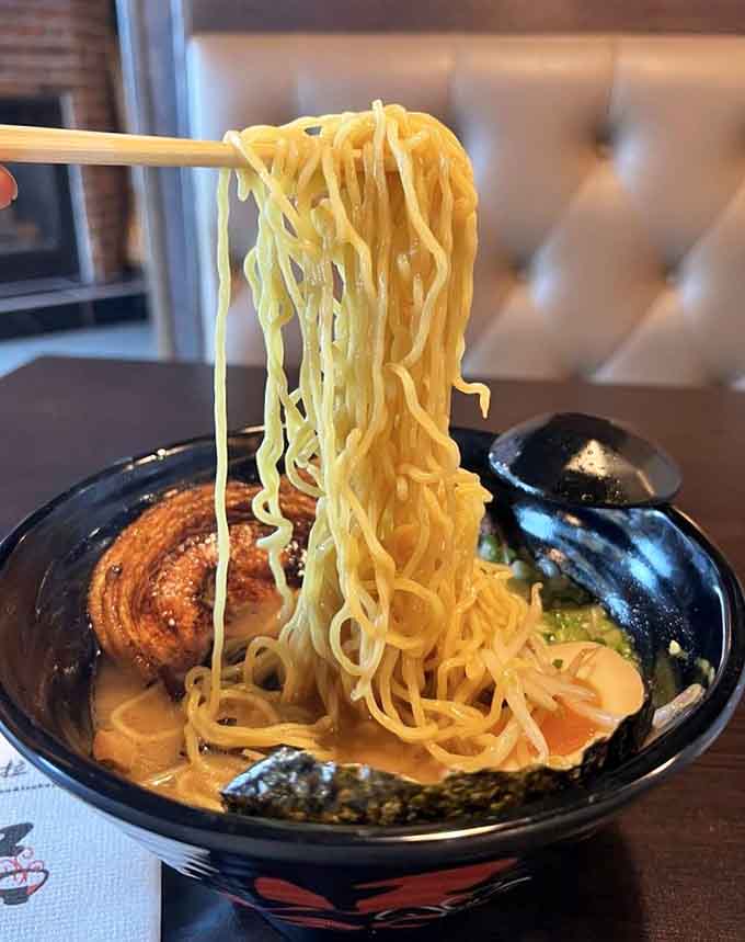 Those noodles suspended mid-slurp are about to deliver a mouthful of rich, porky, absolutely soul-satisfying flavor.