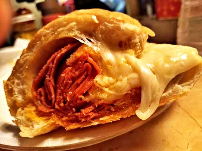The legendary pepperoni roll in all its glory&mdash;layers of spicy meat and melted cheese embraced by perfectly baked bread. Worth every mile of the drive.