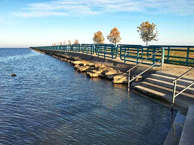 The park's kayak launch invites adventure seekers to explore Saginaw Bay's gentle waters – no experience required, just curiosity.