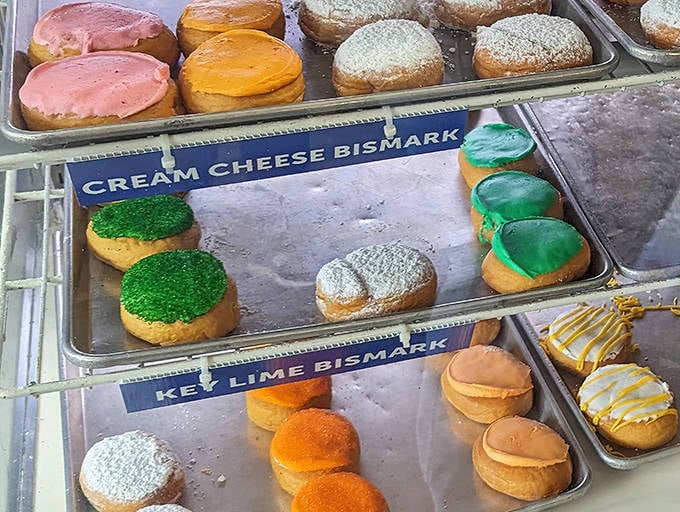 Behold the legendary Key Lime Bismarks &ndash; vibrant green-topped treasures filled with tangy-sweet citrus cream that's worth crossing state lines for.