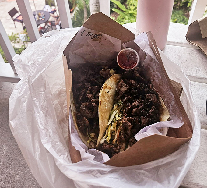 Korean Barbeque Tacos: The star attraction! Tender marinated beef nestled in soft tortillas with the perfect balance of crunch, spice, and that sauce you'll dream about later.