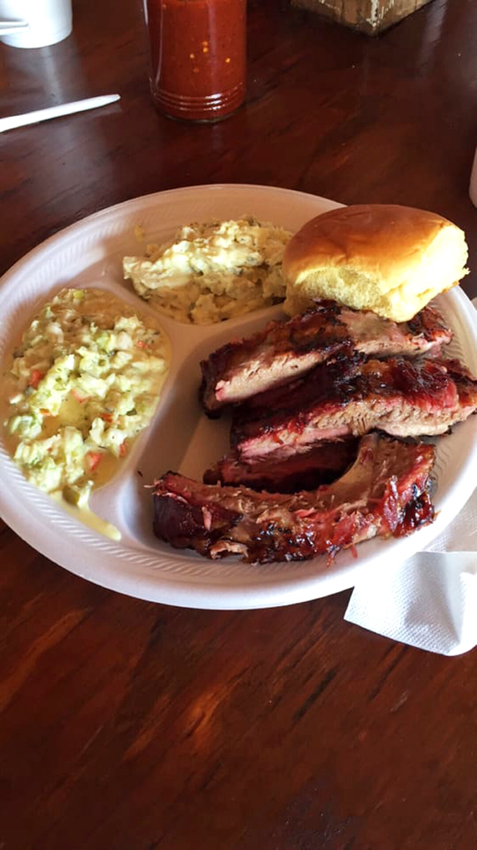 This isn't just a rib plate&mdash;it's a masterclass in barbecue artistry. The potato salad looks like it's having a party all its own!