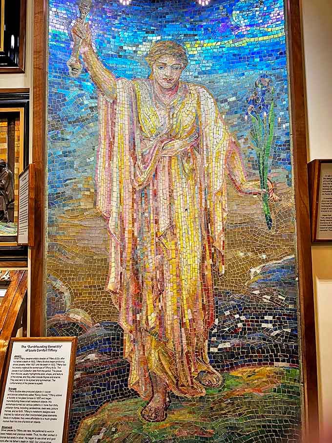 The "Thanksgiving Vespers" mosaic glimmers with thousands of hand-cut tiles, creating a luminous figure that seems to step forward from its azure background.