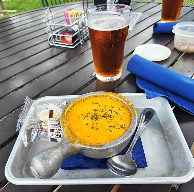 Liquid gold in a crock &ndash; this velvety orange elixir with tender lobster chunks has caused more spontaneous happy dances than a winning lottery ticket.