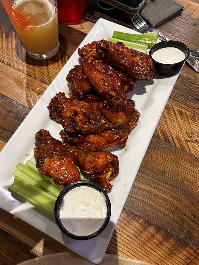 Golden, crispy, and glistening with sauce, these wings look like they're ready for their close-up.